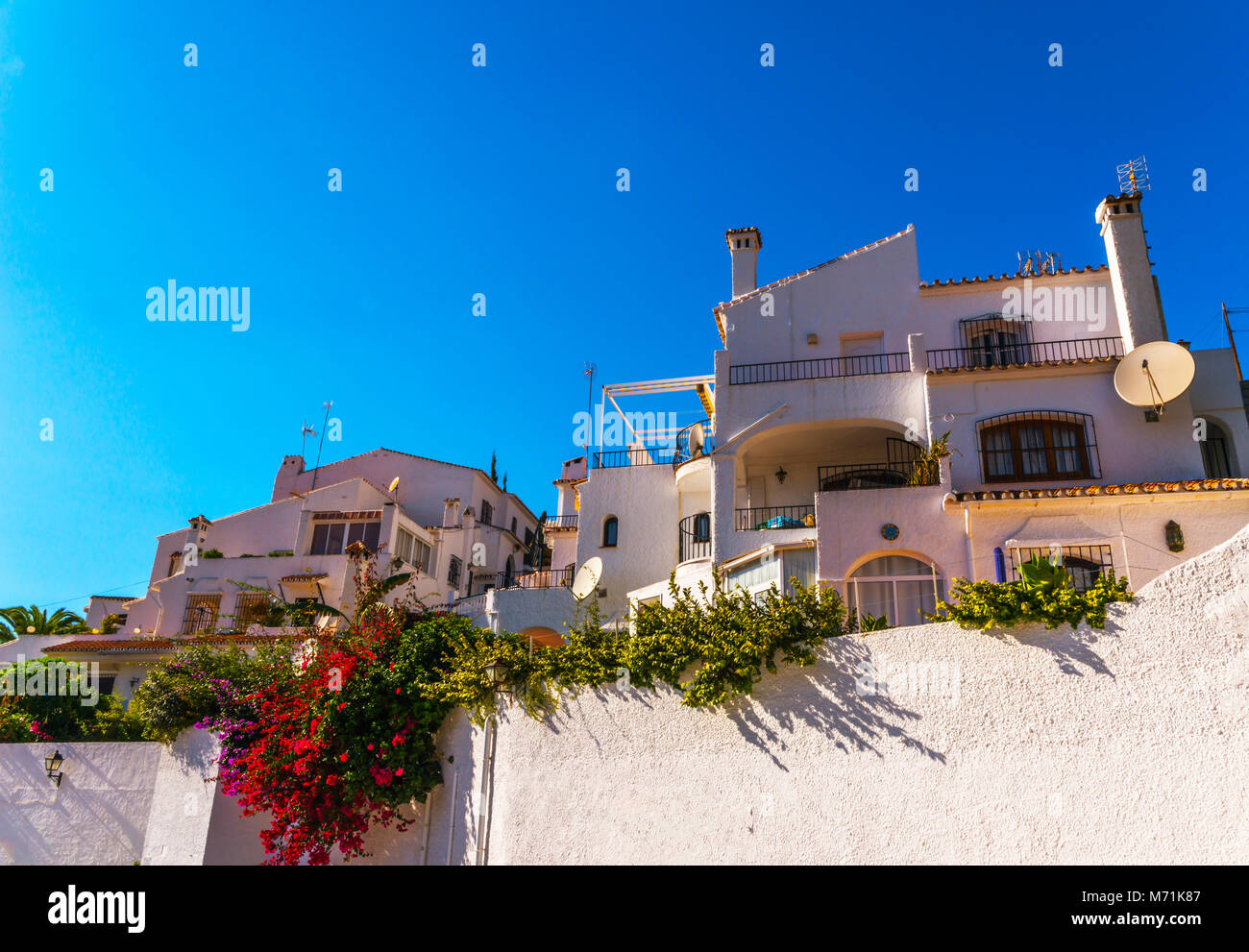 beautiful, picturesque street, narrow road, white facades of buildings ...