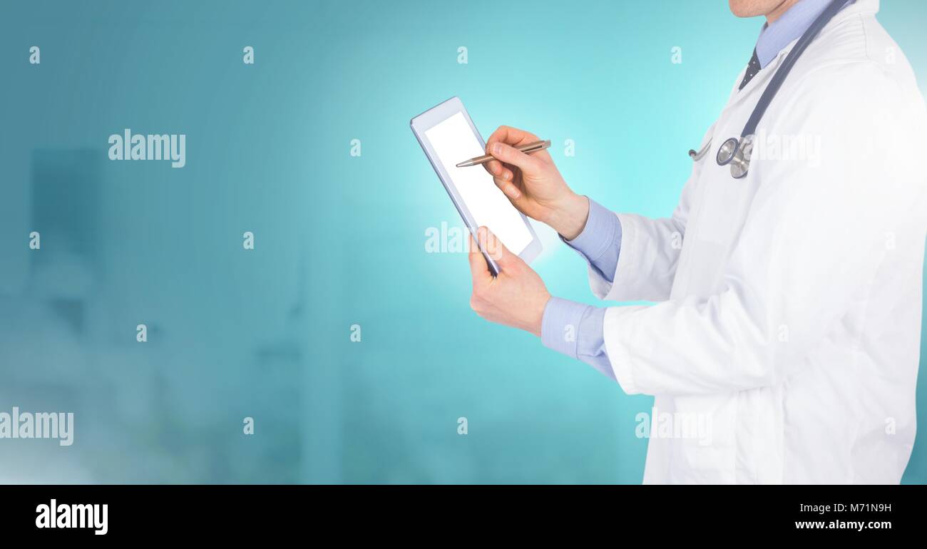 Doctor holding tablet Stock Photo - Alamy