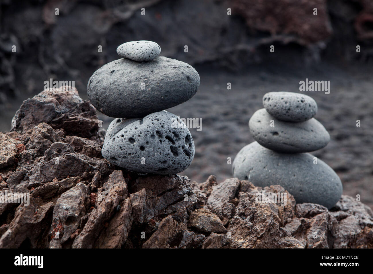 Two stones balanced on pile of rocks hi-res stock photography and ...