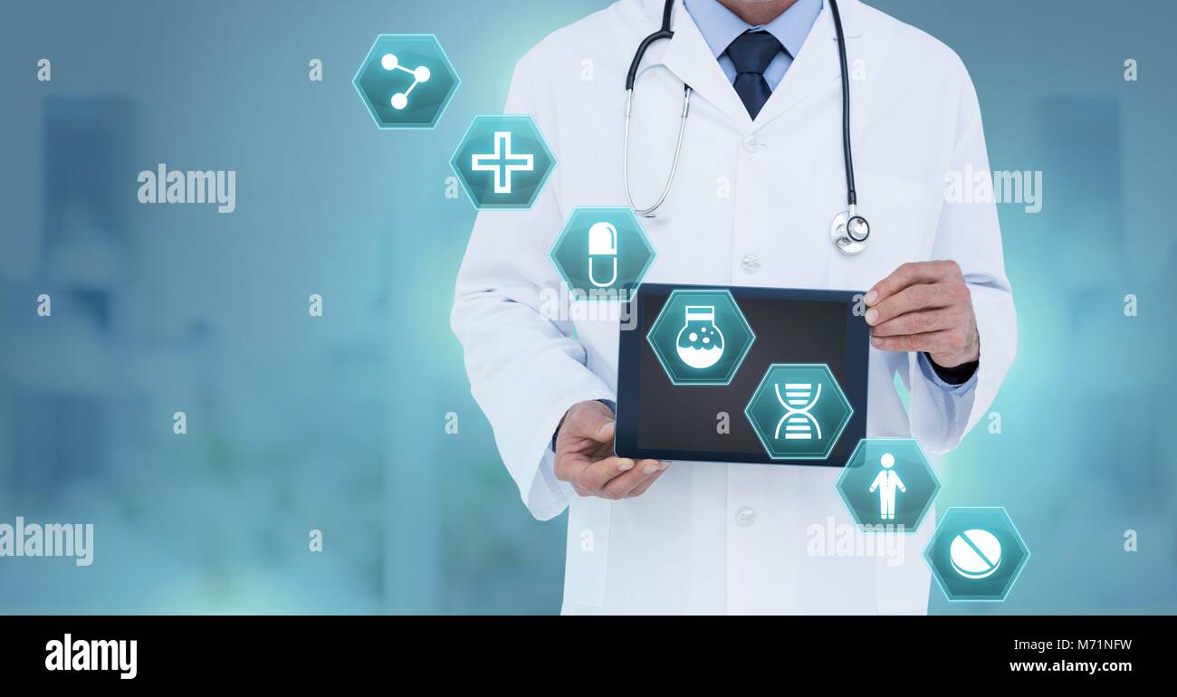 Doctor holding tablet with medical interface hexagon icons Stock Photo ...