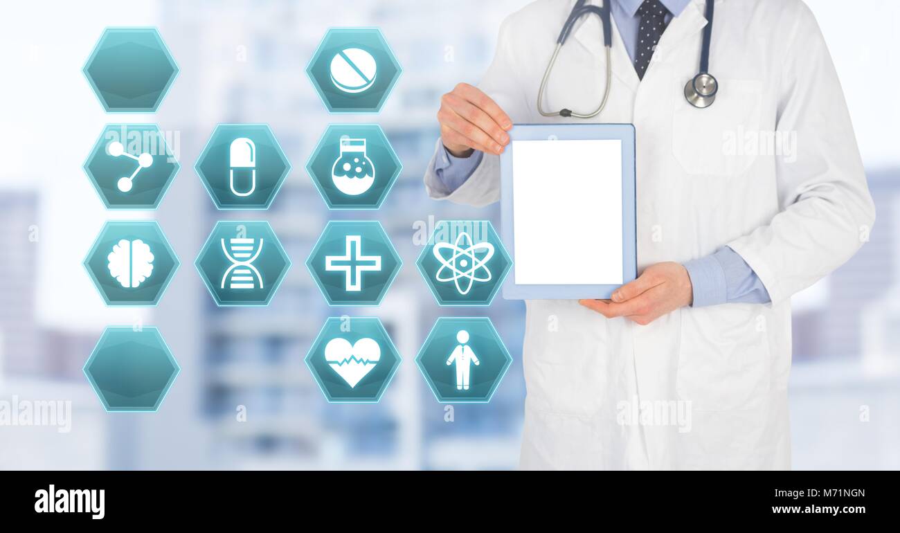 Doctor holding tablet with medical interface hexagon icons Stock Photo ...