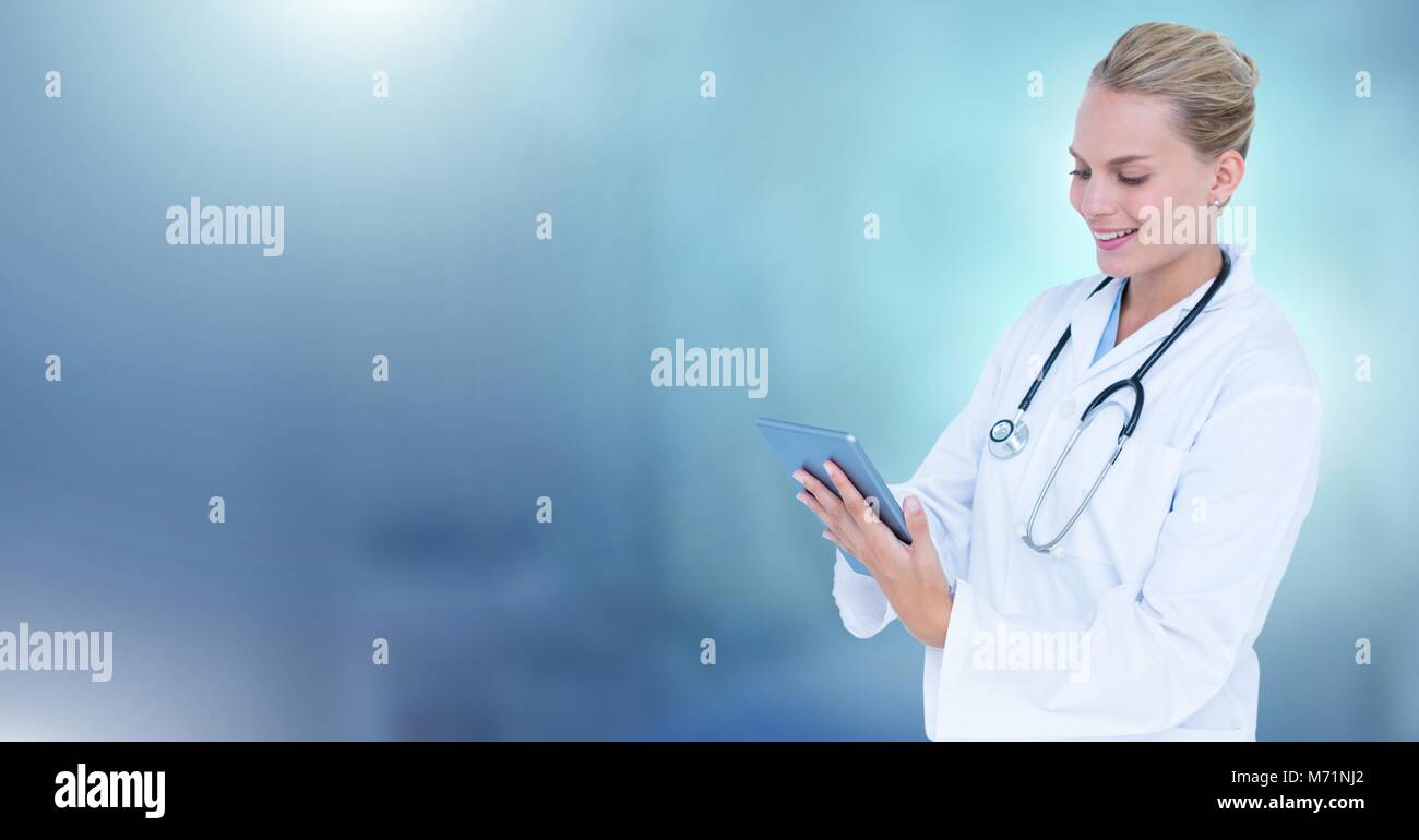 Female doctor holding tablet Stock Photo - Alamy