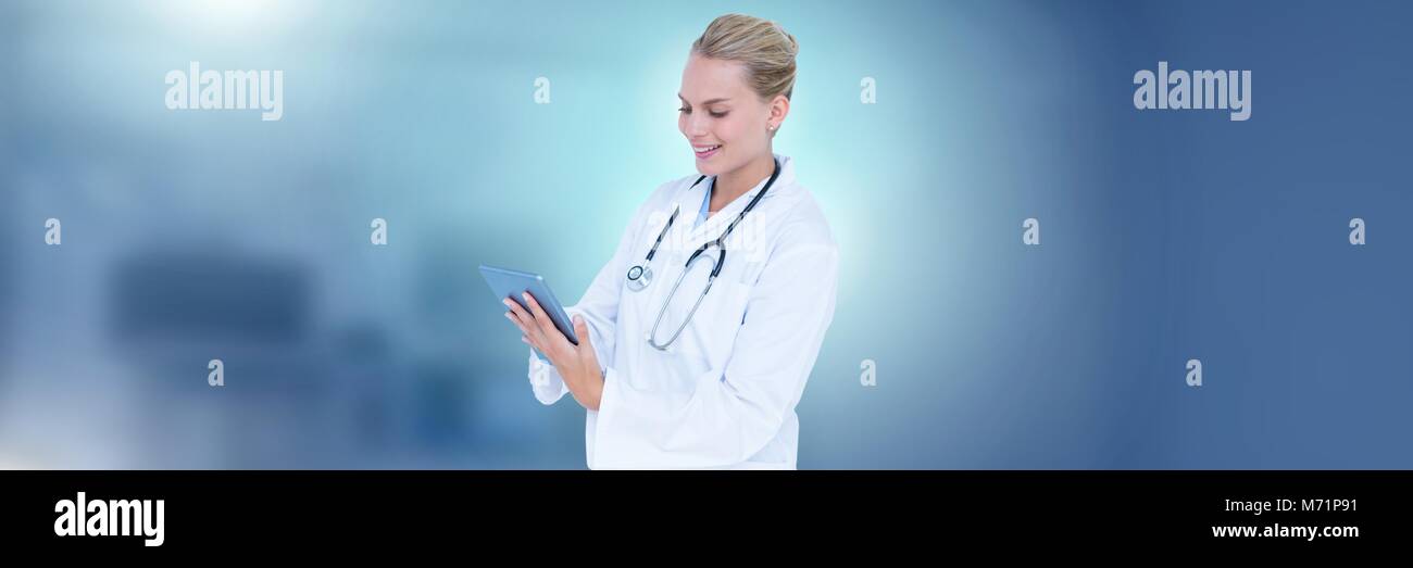 Female doctor holding tablet Stock Photo - Alamy