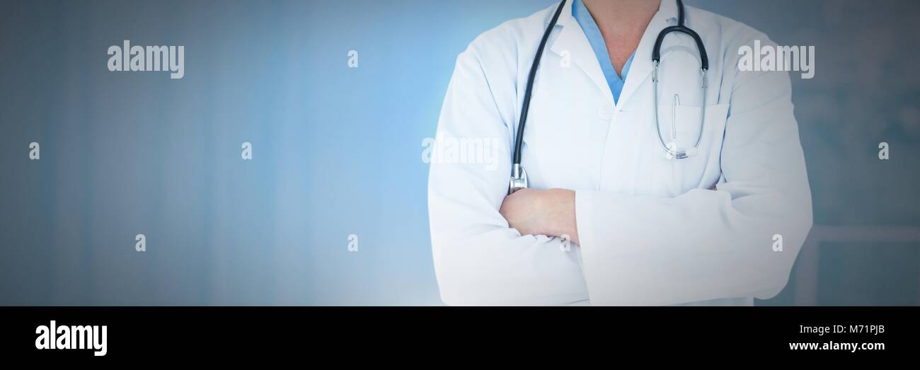 Doctor with arms folded Stock Photo - Alamy