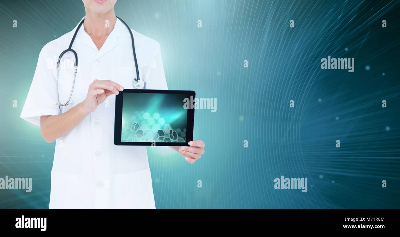 Female doctor holding tablet Stock Photo - Alamy