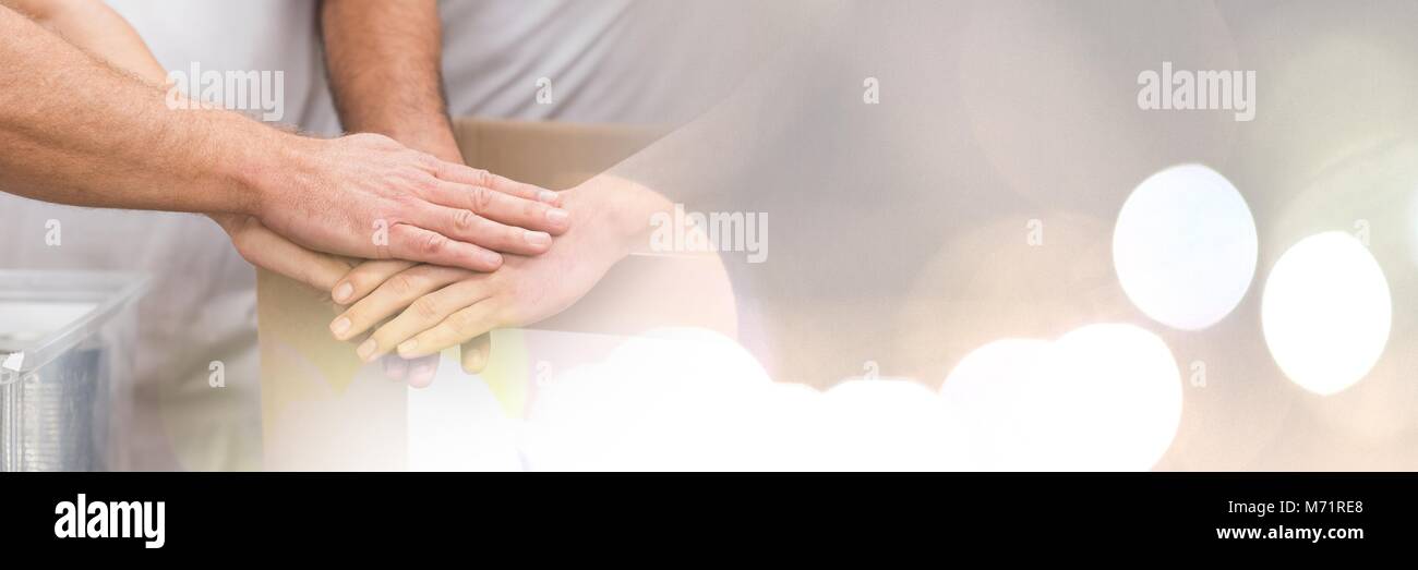 Teamwork transition with joining hands Stock Photo - Alamy