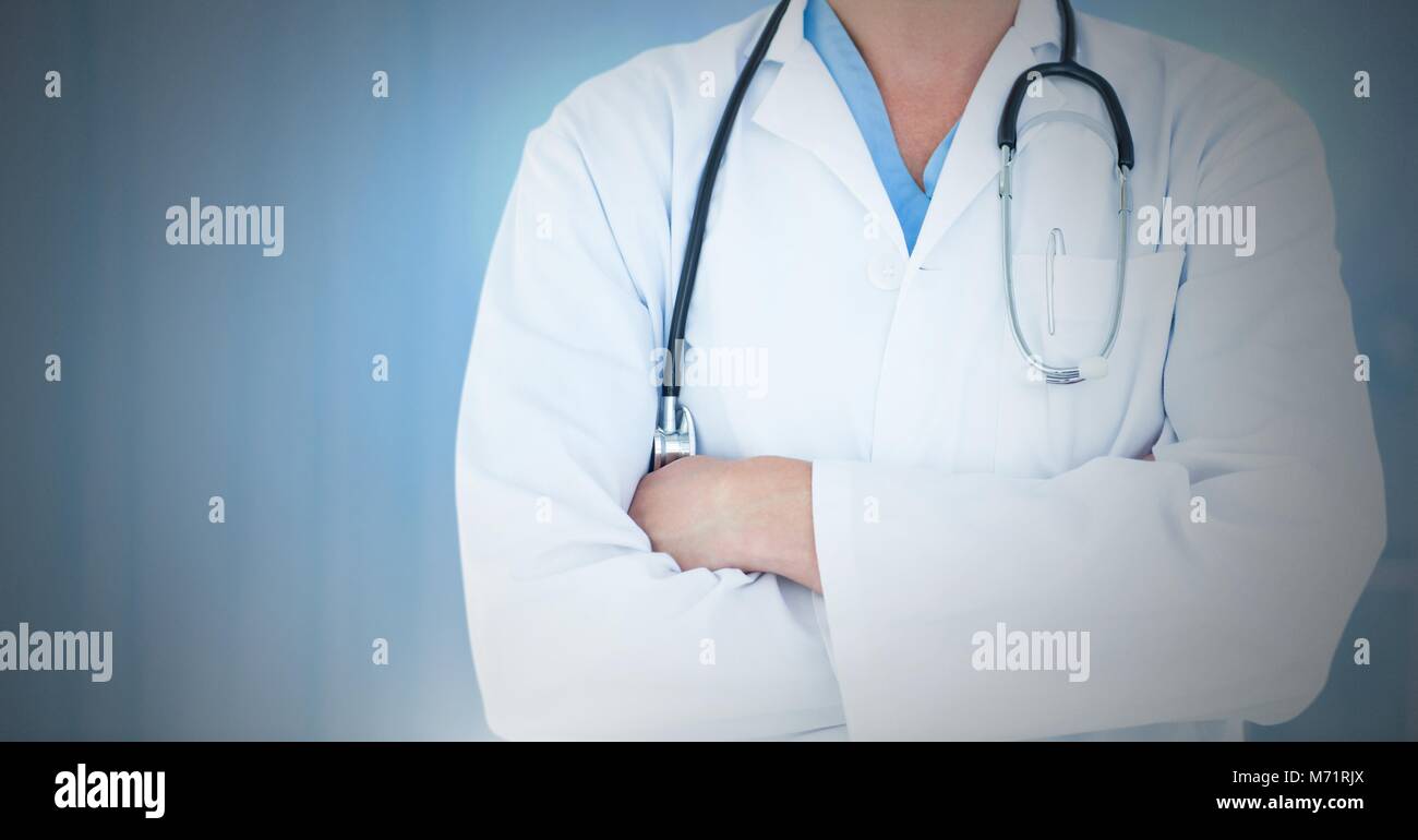 Doctor with arms folded Stock Photo - Alamy