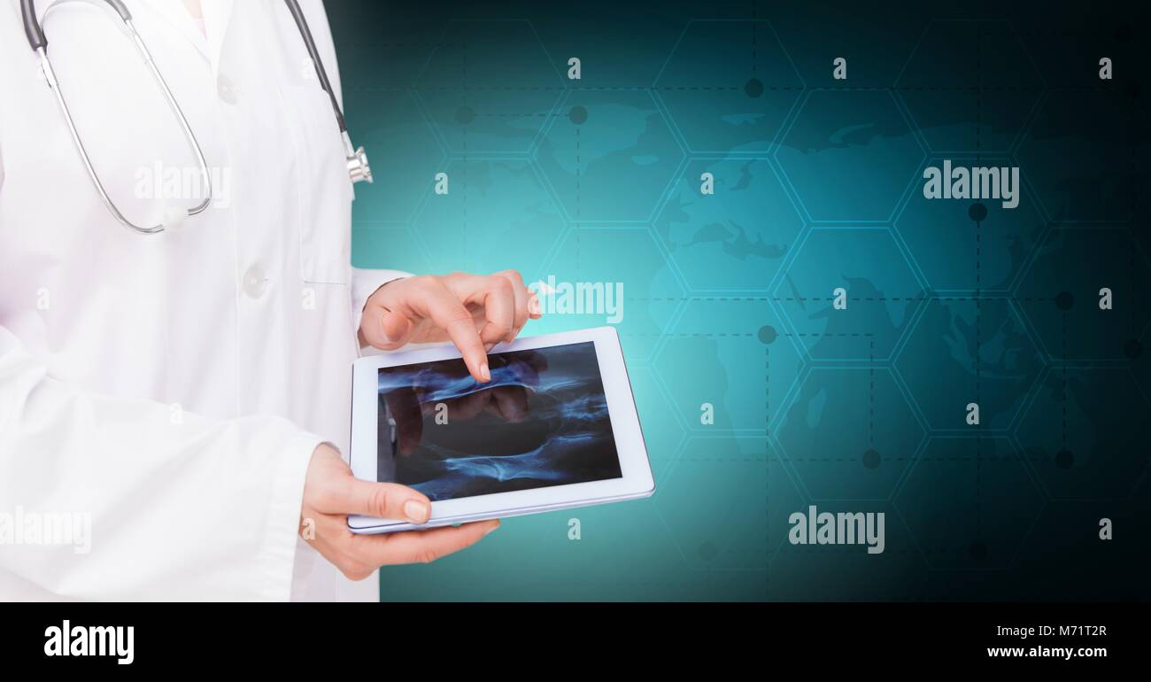 Doctor holding tablet Stock Photo - Alamy