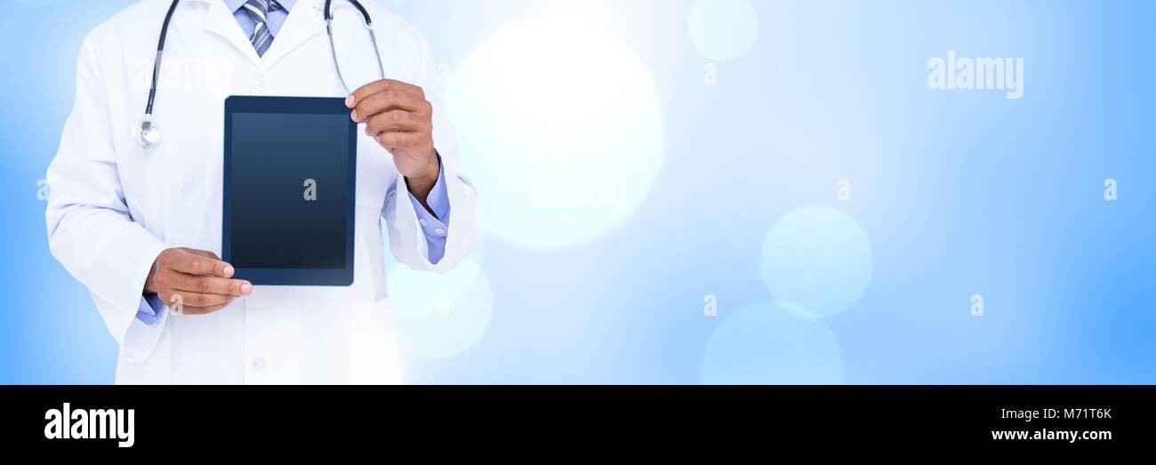 Doctor holding tablet hi-res stock photography and images - Alamy