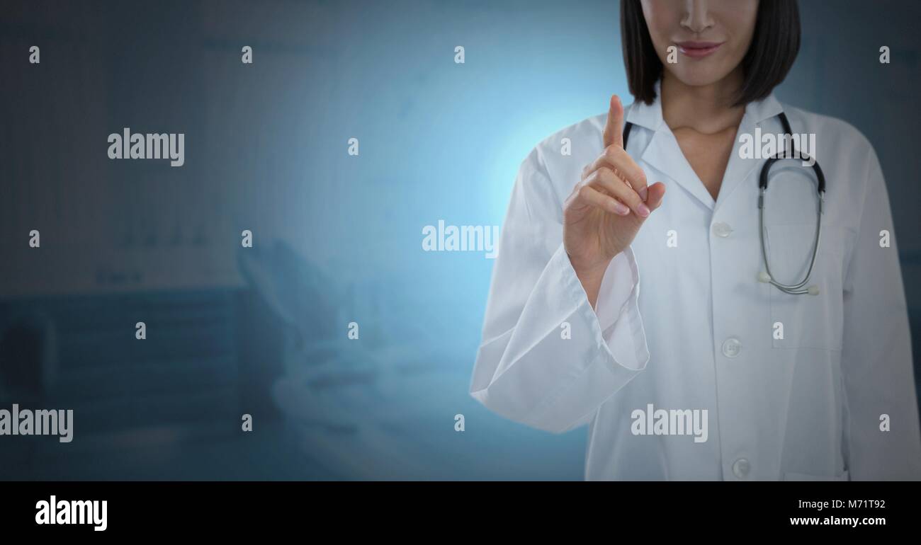 Female doctor interacting with air touch Stock Photo - Alamy