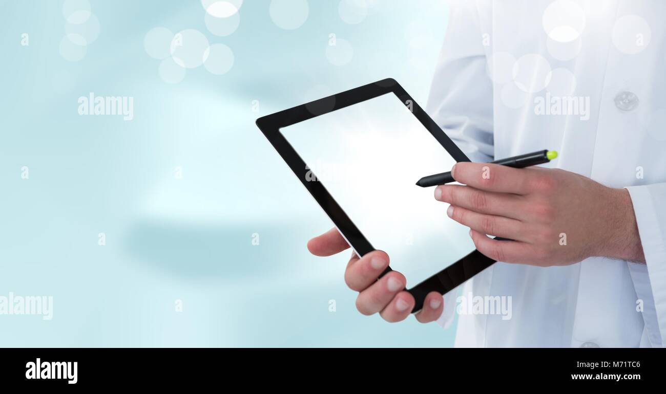 Doctor holding tablet Stock Photo - Alamy