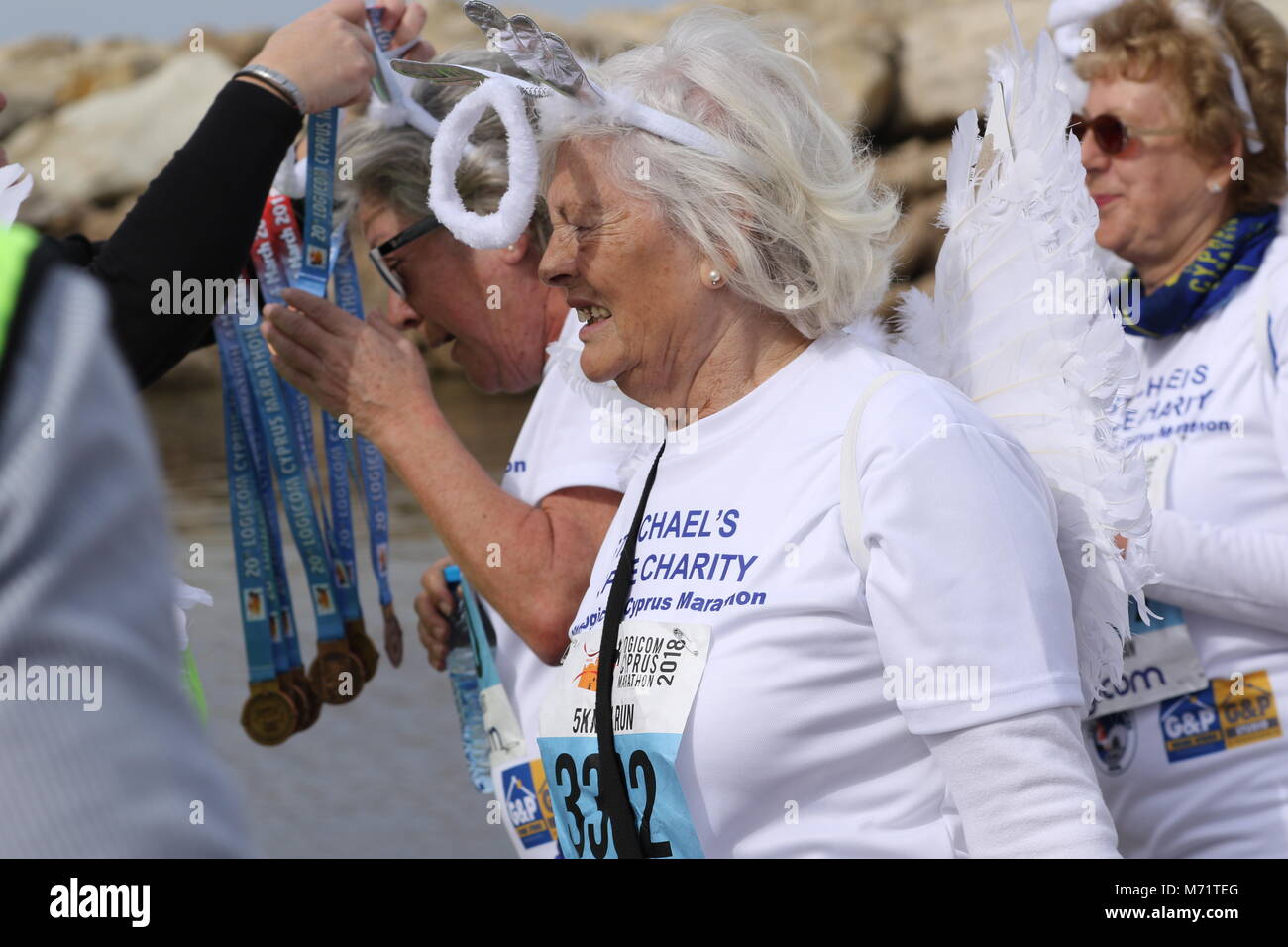 Runners for charity at the 20th Logicom Cyprus marathon, half marathon ...