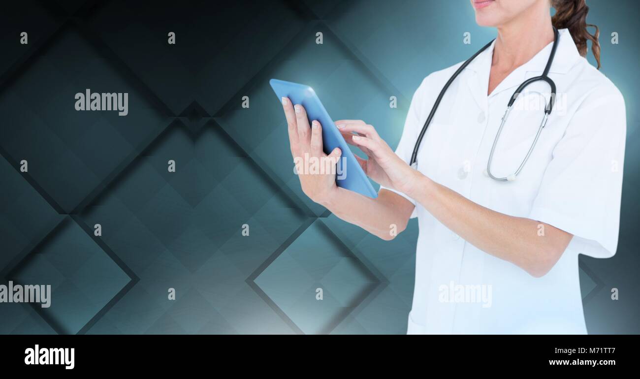 Female doctor holding tablet Stock Photo - Alamy