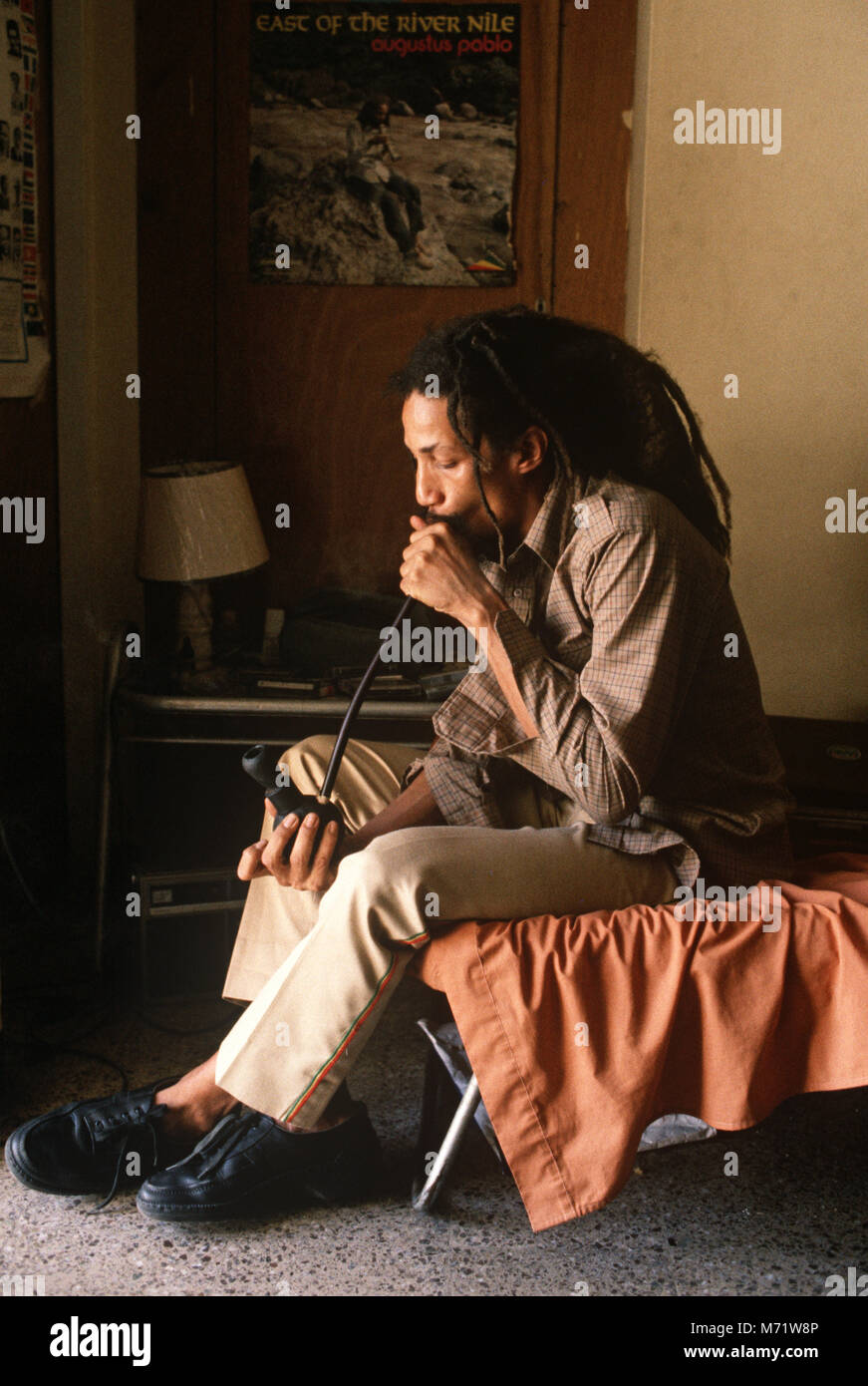 Augustus Pablo smoking, Kingston.Jamaica Stock Photo - Alamy