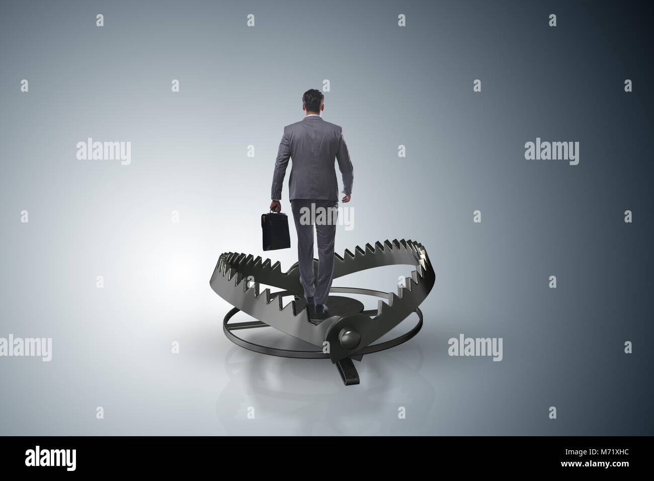 Man caught in mouse trap in risk business concept Stock Photo - Alamy