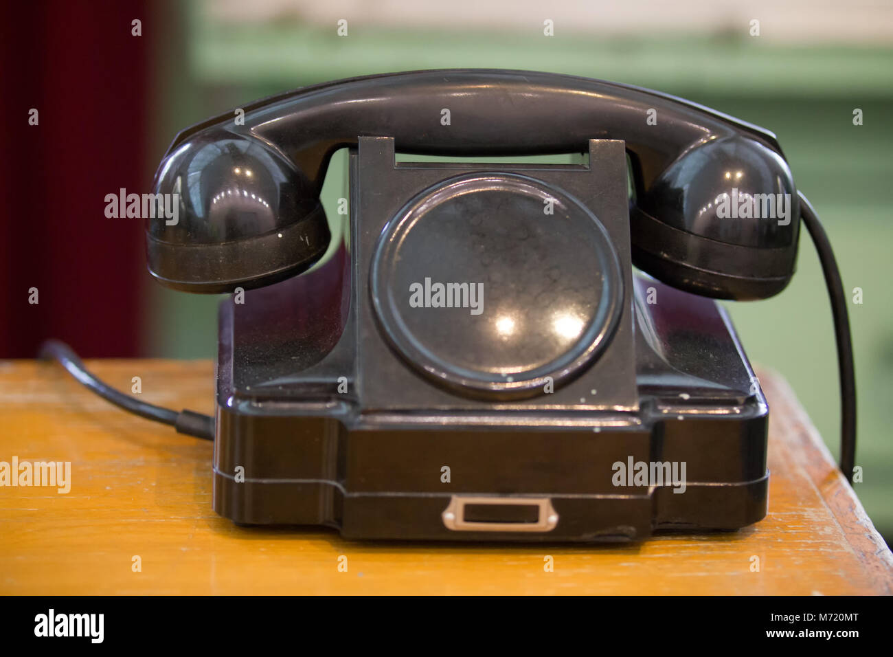 Vintage telephone on wooden table Stock Photo - Alamy