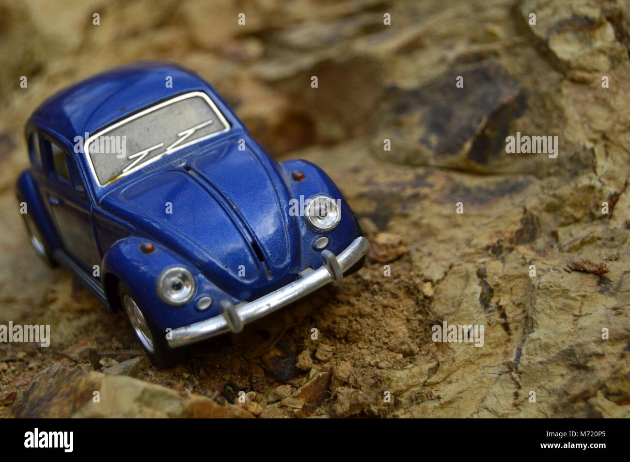 blue toy car on mountain Stock Photo - Alamy