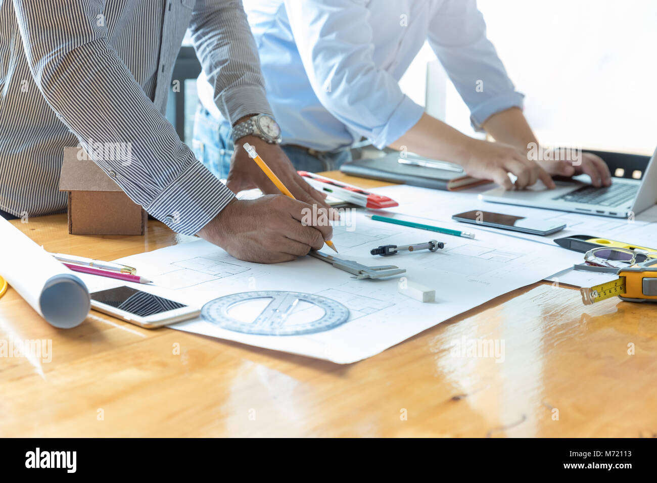 Engineer and Architect concept, Engineer Architects office team working ...