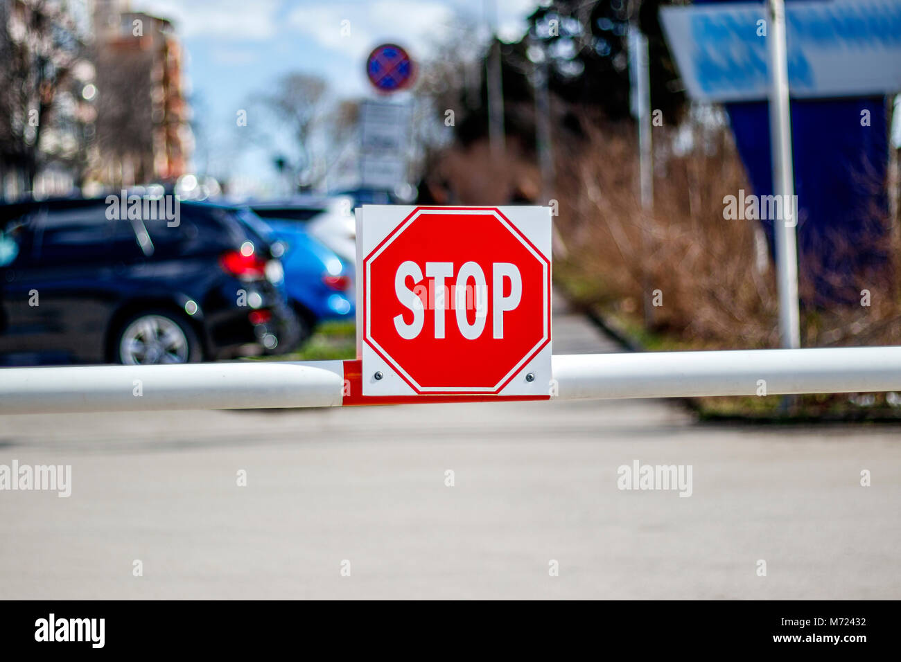 barrier with stop sign Stock Photo - Alamy