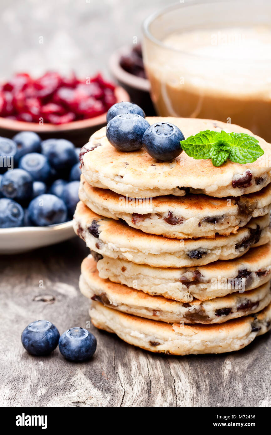 Stack of welsh cakes with blueberry and a cup of coffee Stock Photo - Alamy