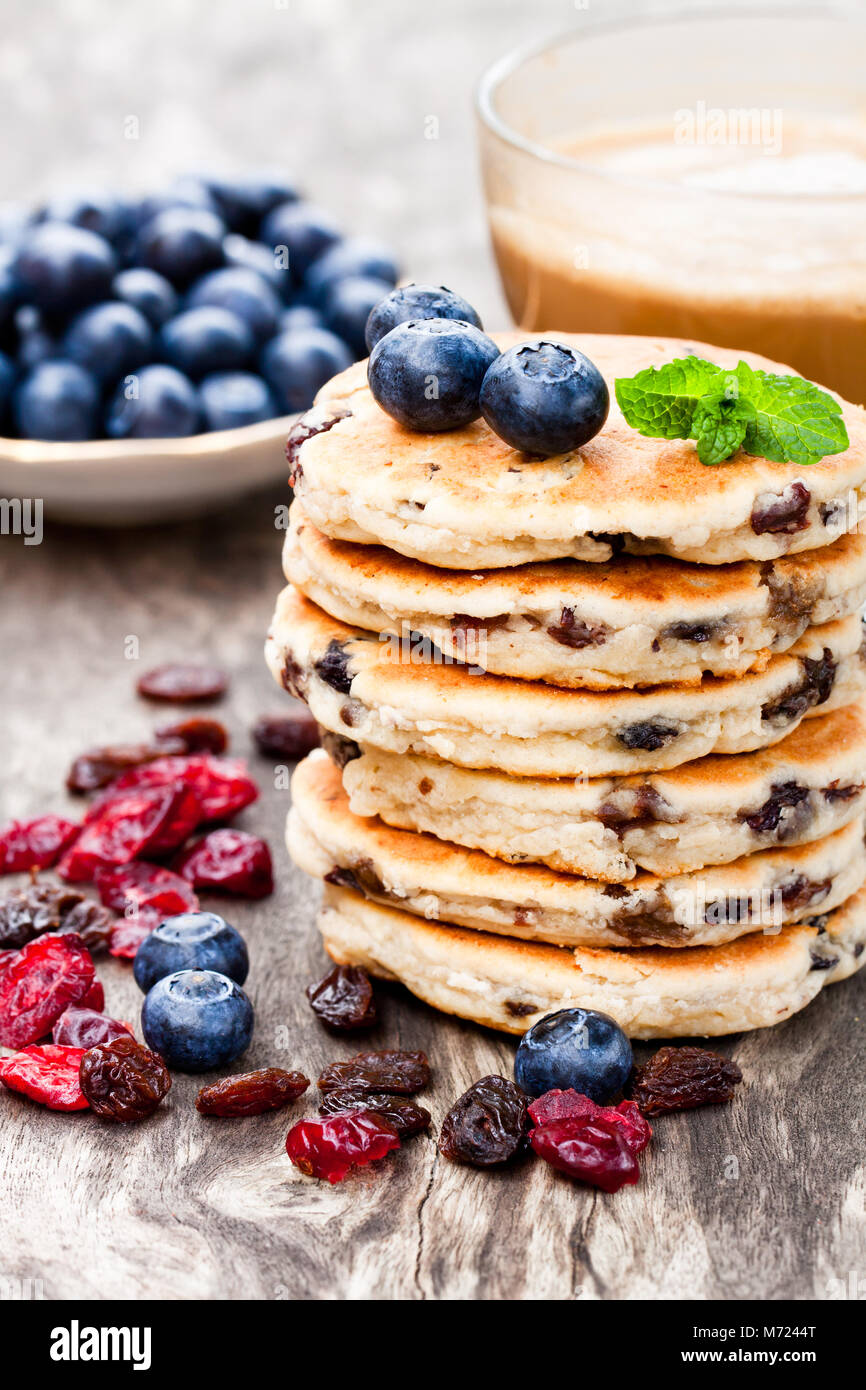 Stack of welsh cakes with blueberry and a cup of coffee Stock Photo - Alamy