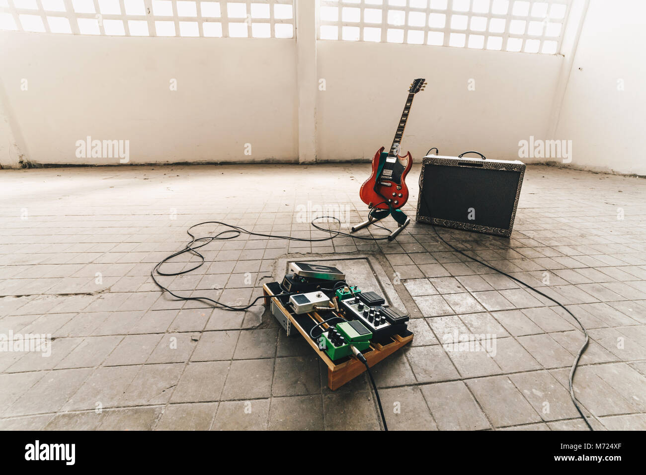 Electric guitar with amplifier and Electric guitar stomp box effectors ...