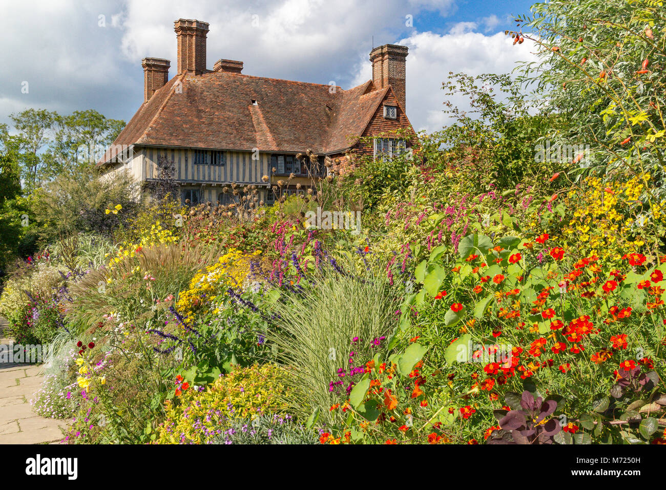The Long Border and House at Great Dixter, Northiam, East Sussex, UK ...