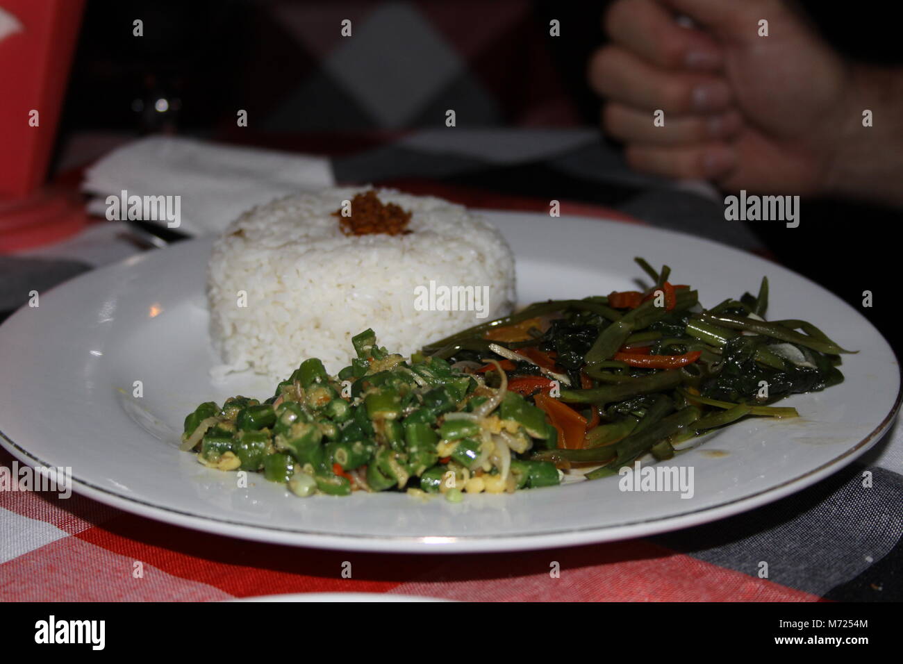 Delicious Balinese rice with vegetables Stock Photo - Alamy