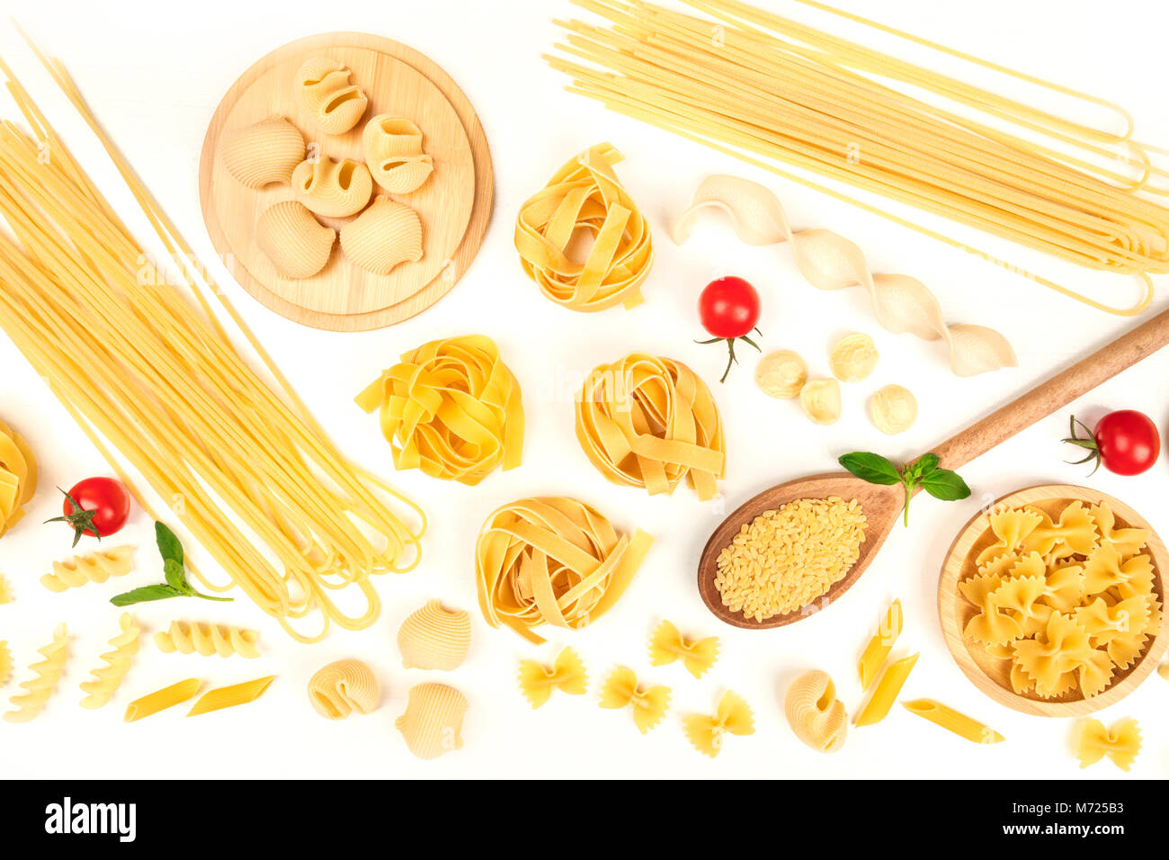 Overhead photo of different types of pasta on white Stock Photo - Alamy