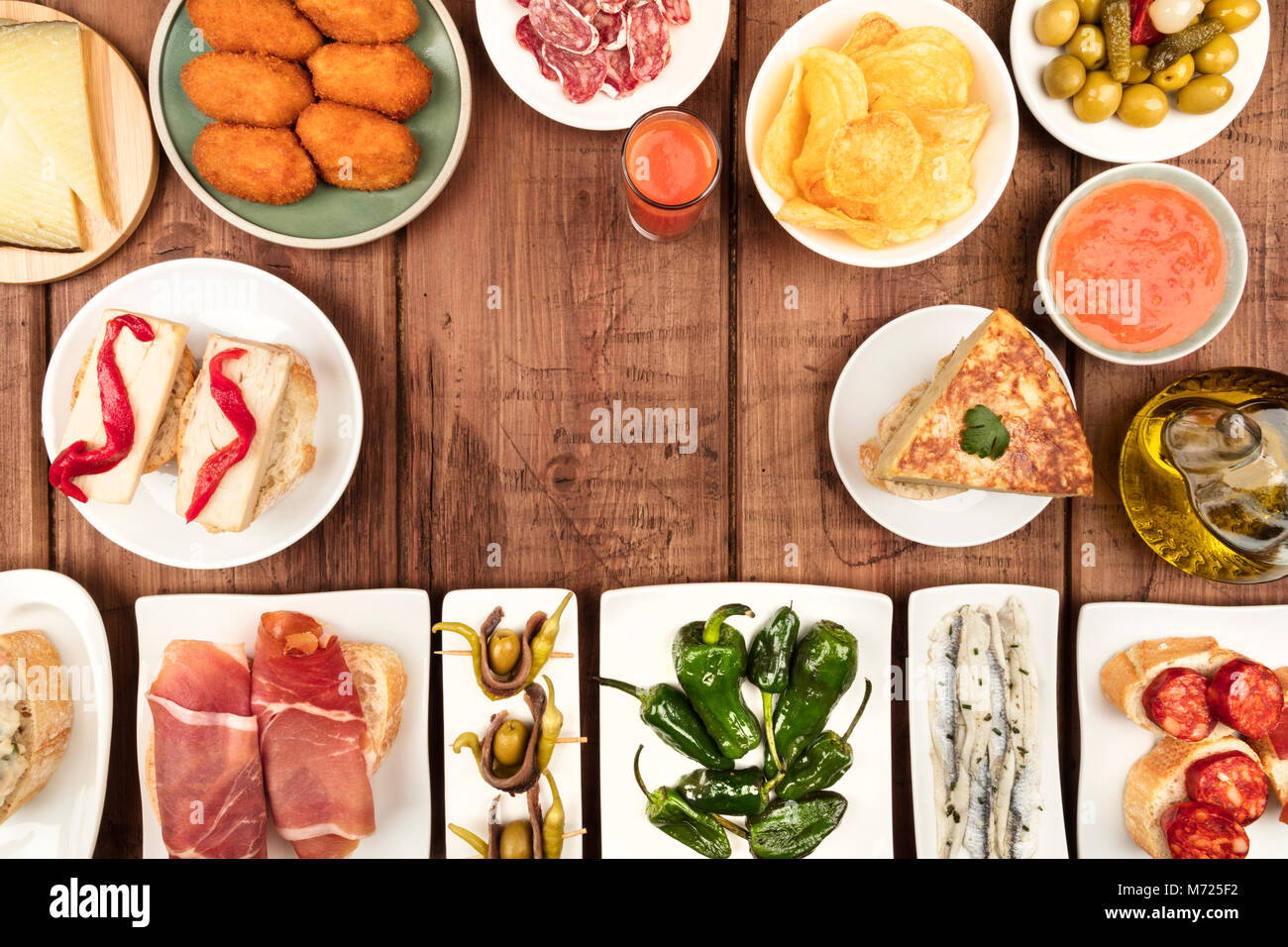 The food of Spain. Overhead photo of many different Spanish tapas with ...