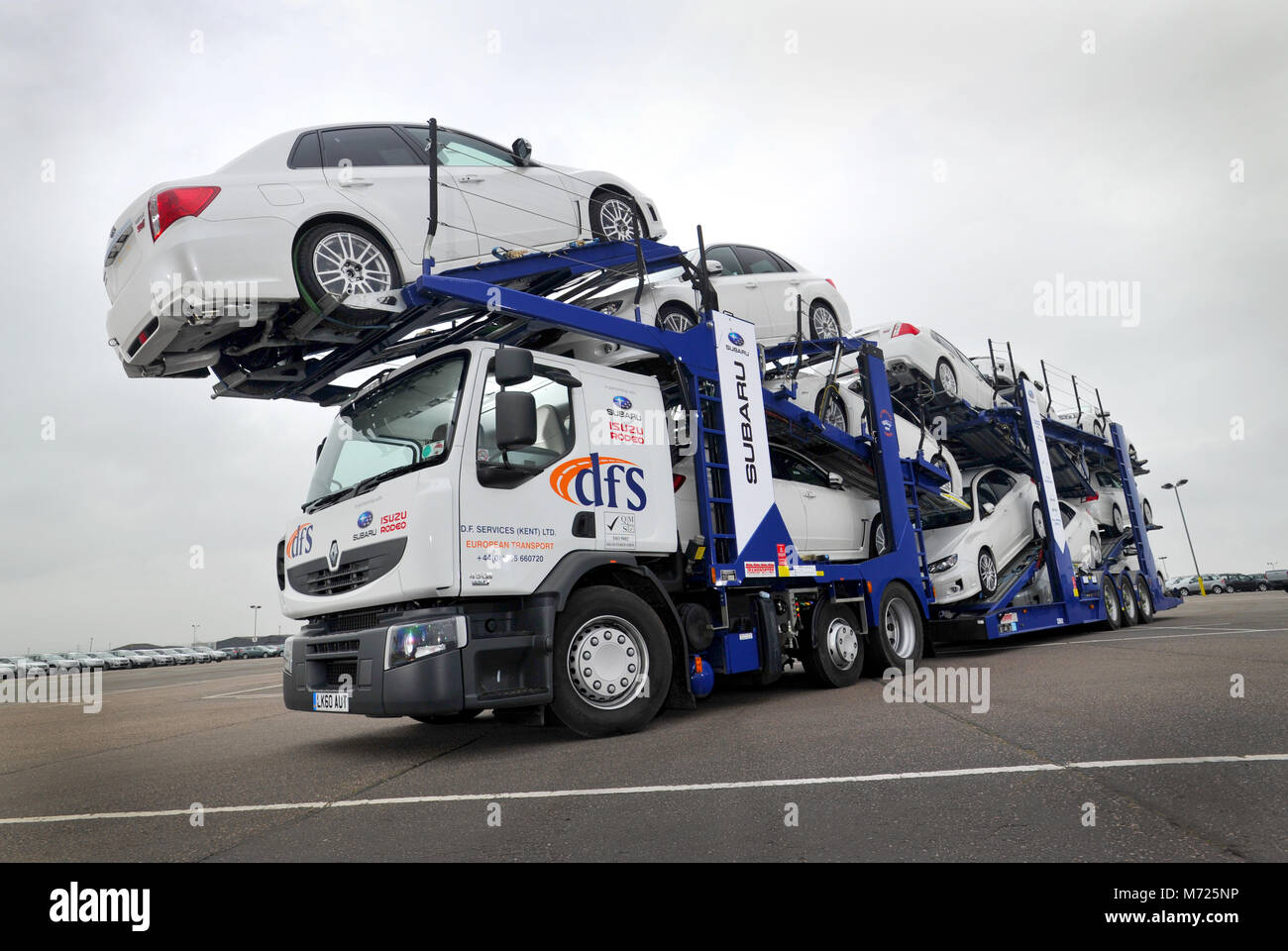car transporter lorry loaded with new cars Stock Photo - Alamy