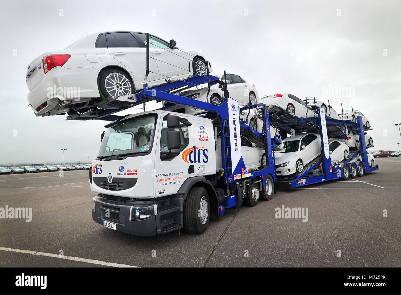 car transporter lorry loaded with new cars Stock Photo - Alamy