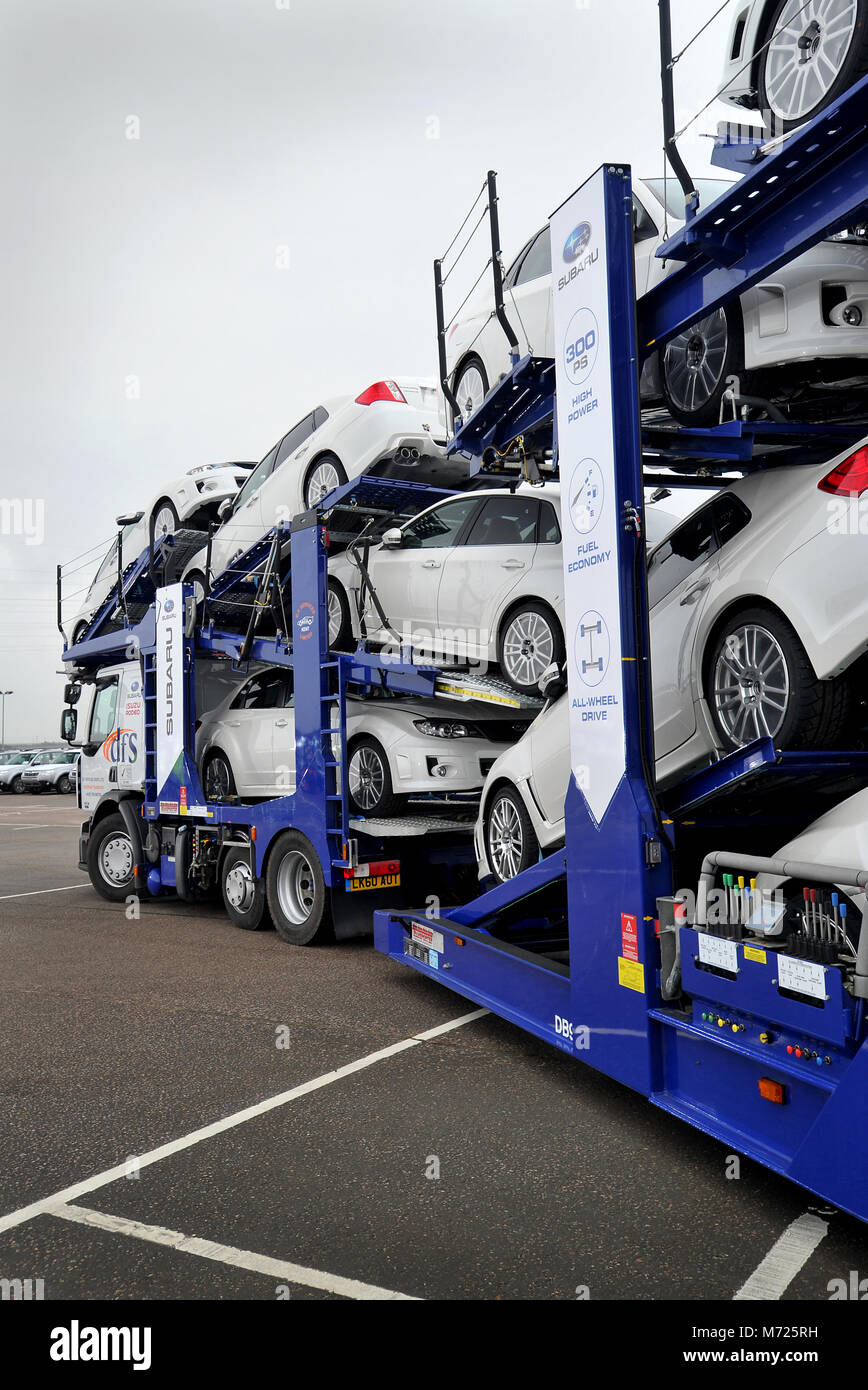 car transporter lorry loaded with new cars Stock Photo - Alamy