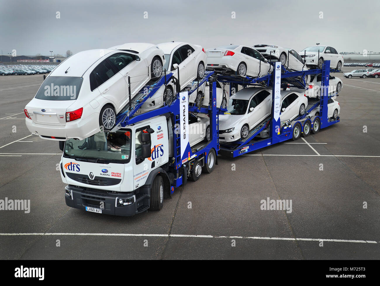 car transporter lorry loaded with new cars Stock Photo - Alamy