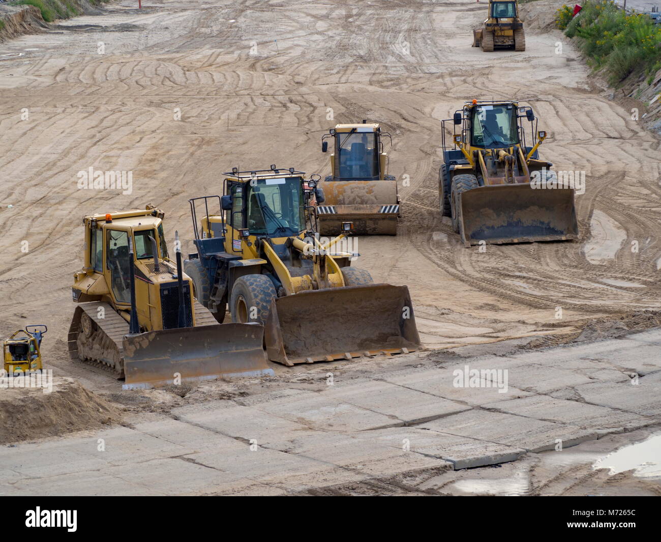 Bulldozers after working day Stock Photo - Alamy