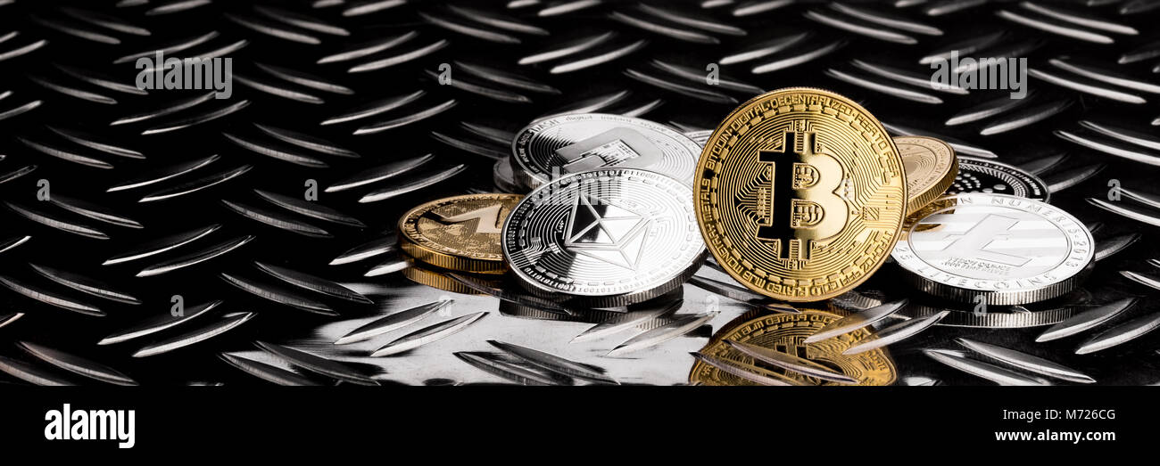 stack of golden silver crypto currency coin on metal diamond steel ...