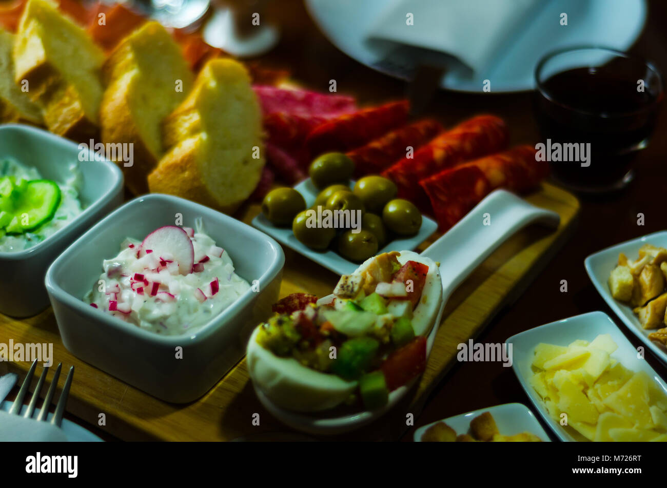 Set with different appetizers in small portions, healthy and delicious ...
