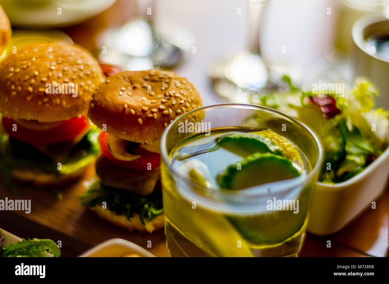 mini burgers with meat, vegetables, cheese and other toppings, bread ...