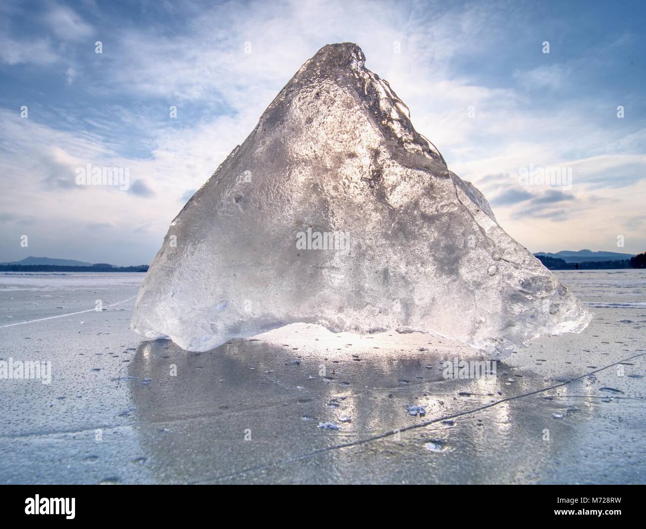 Broken glacier in the frozen bay. Beautiful winter background ...
