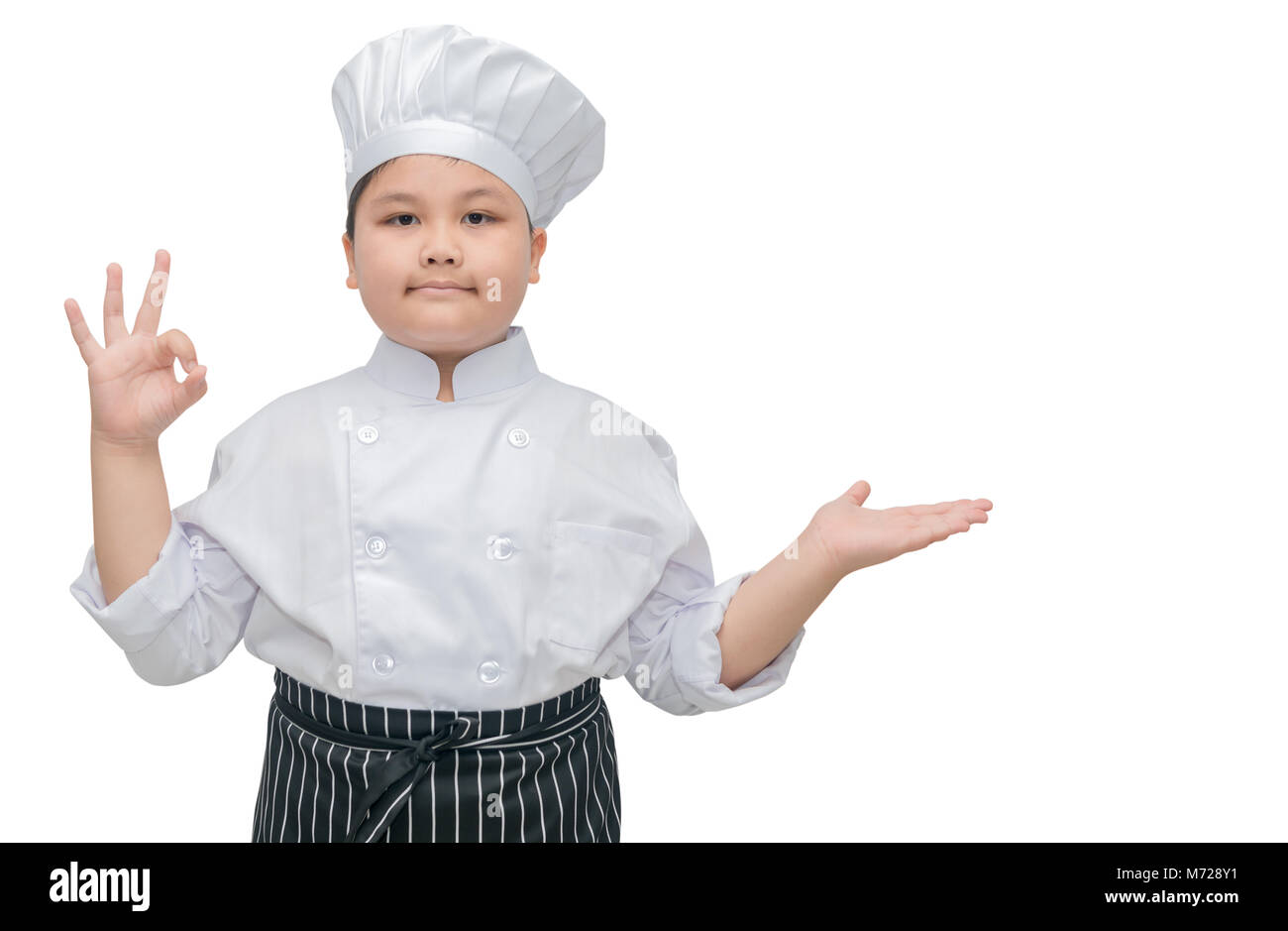 Portrait of fat boy chef cook showing ok sign and present with cook hat ...