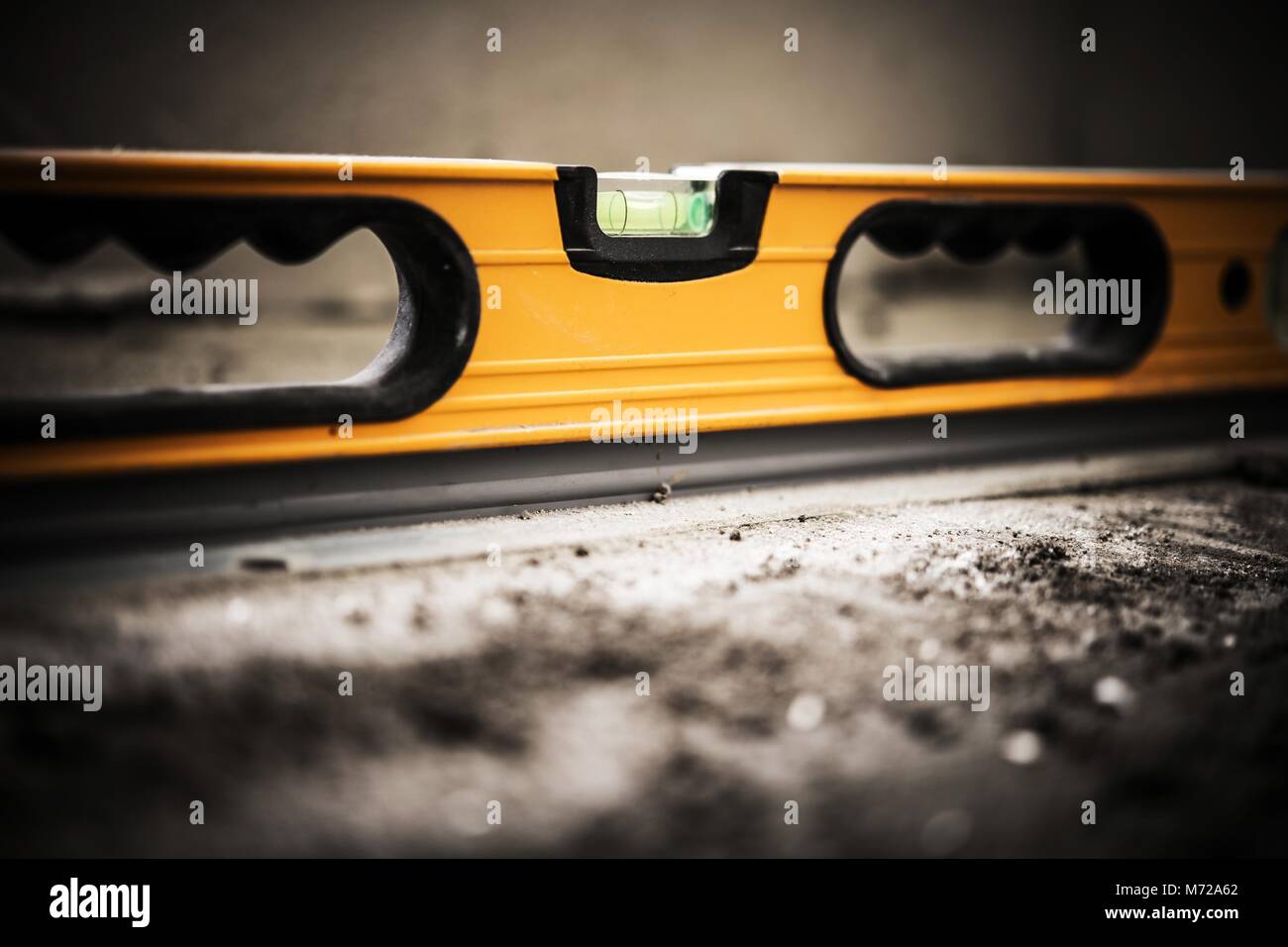 Construction Spirit Level Tool Instrument on the Raw Concrete Floor ...