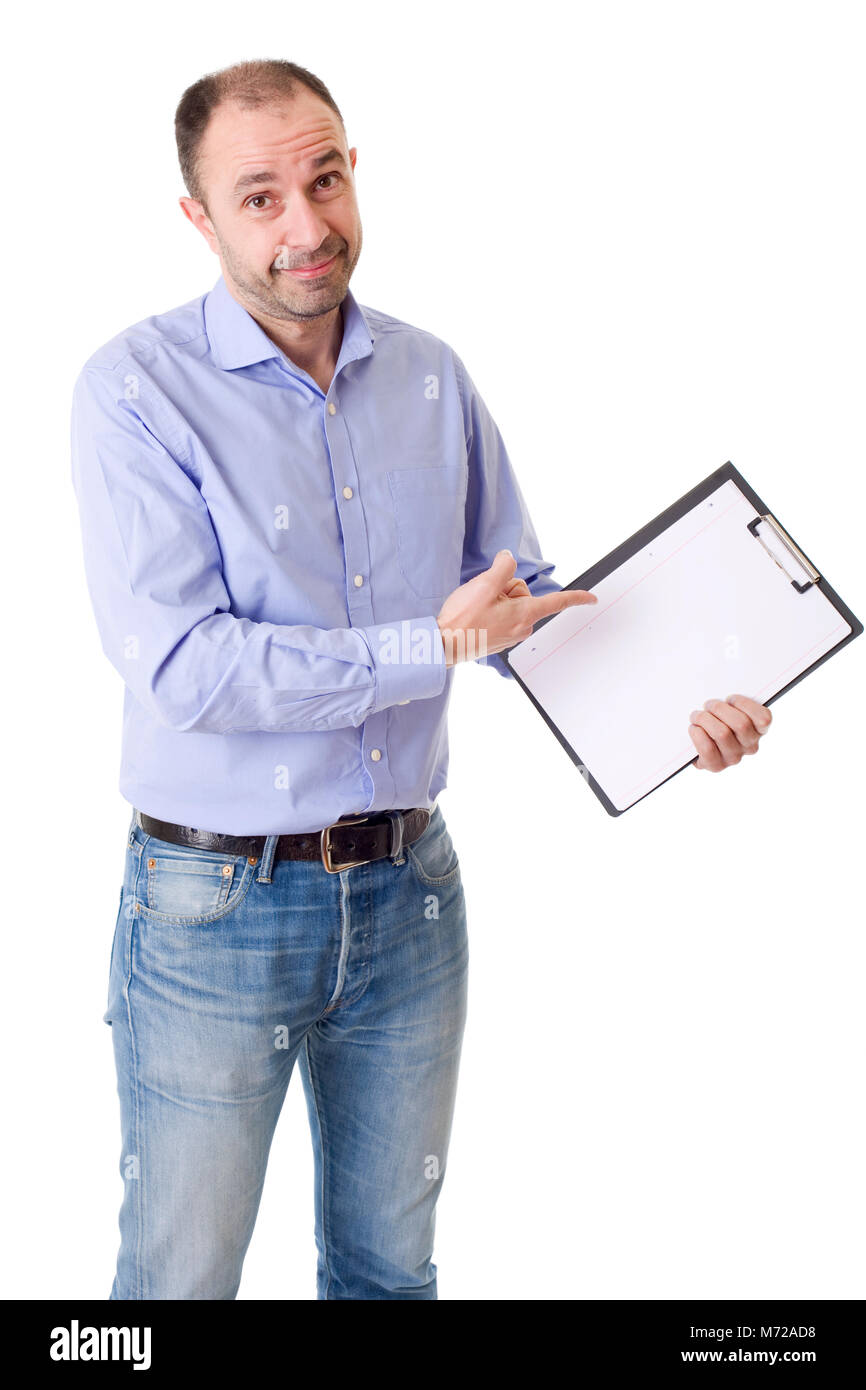 friendly young man pointing to a sheet and looking into the camera ...