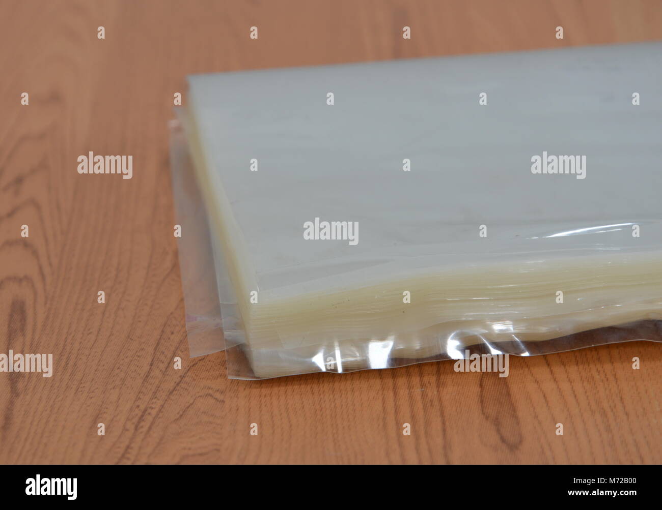 plastic bag packing on table Stock Photo - Alamy