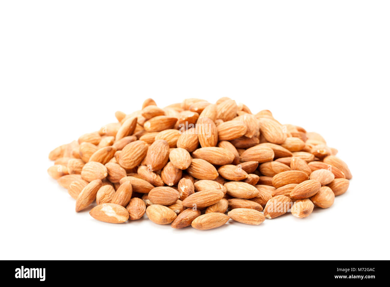 Heap of almonds seed isolated on white background Stock Photo - Alamy