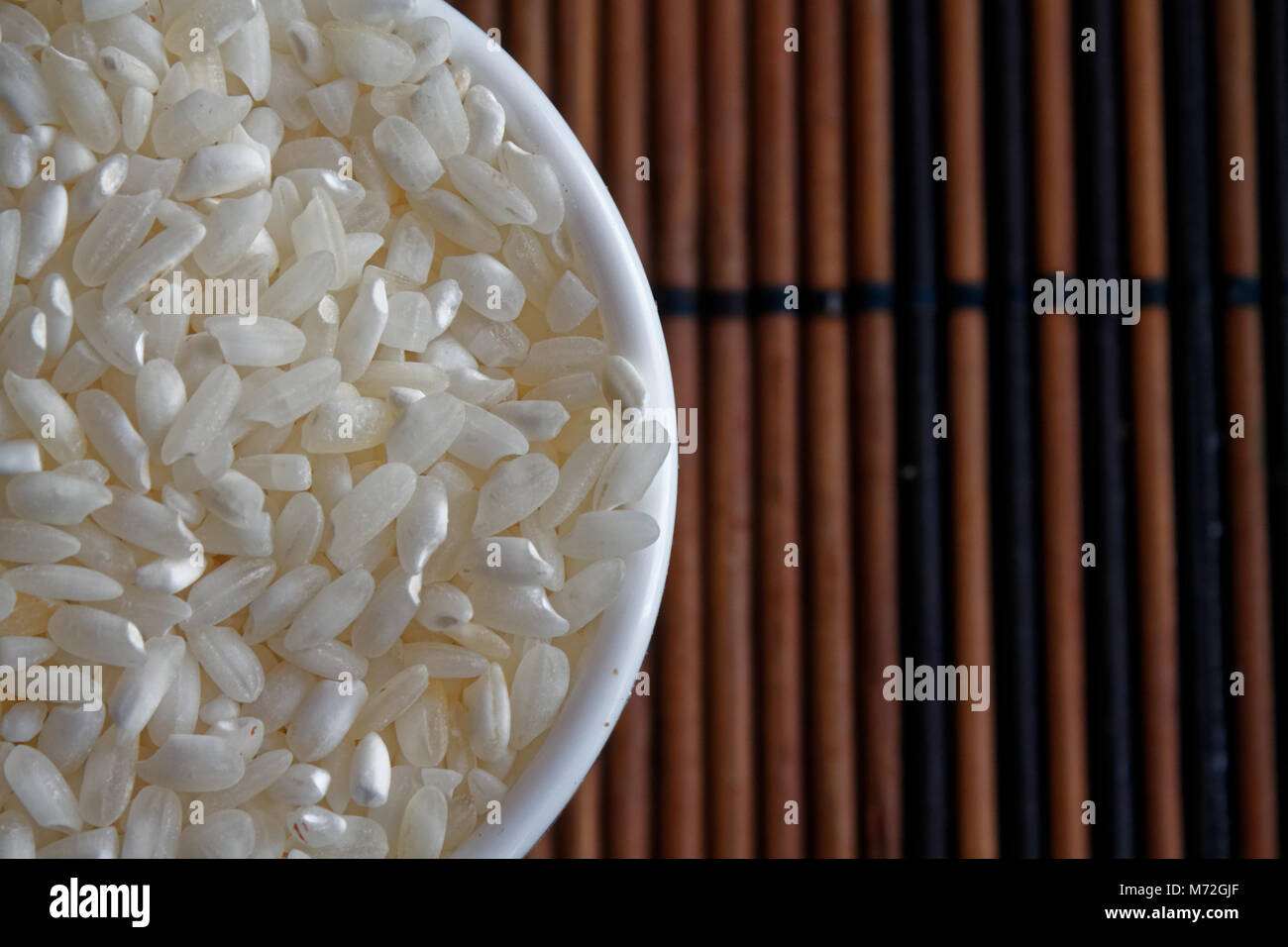 Organic rice in small plate texture, Asian uncooked short milled rice ...