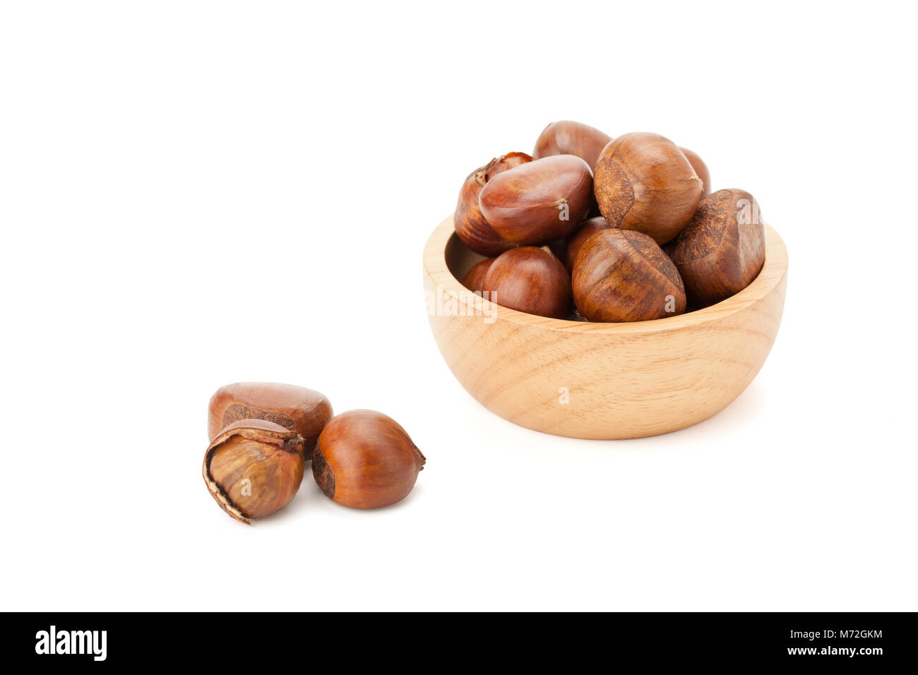 chestnut in wooden bowl isolated on white background with clipping path ...