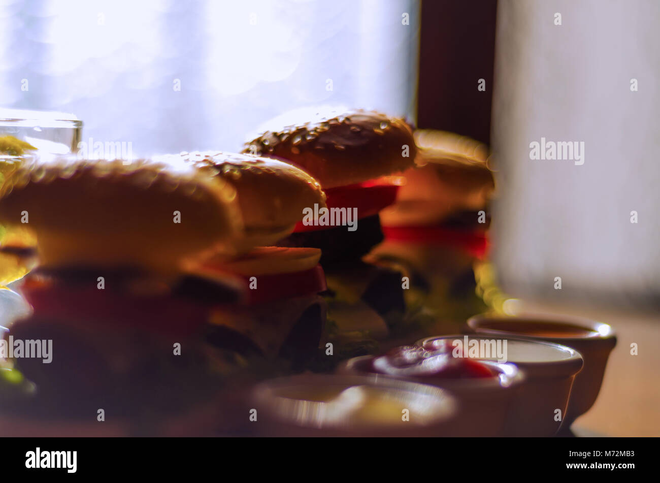 mini burgers with meat, vegetables, cheese and other toppings, bread ...