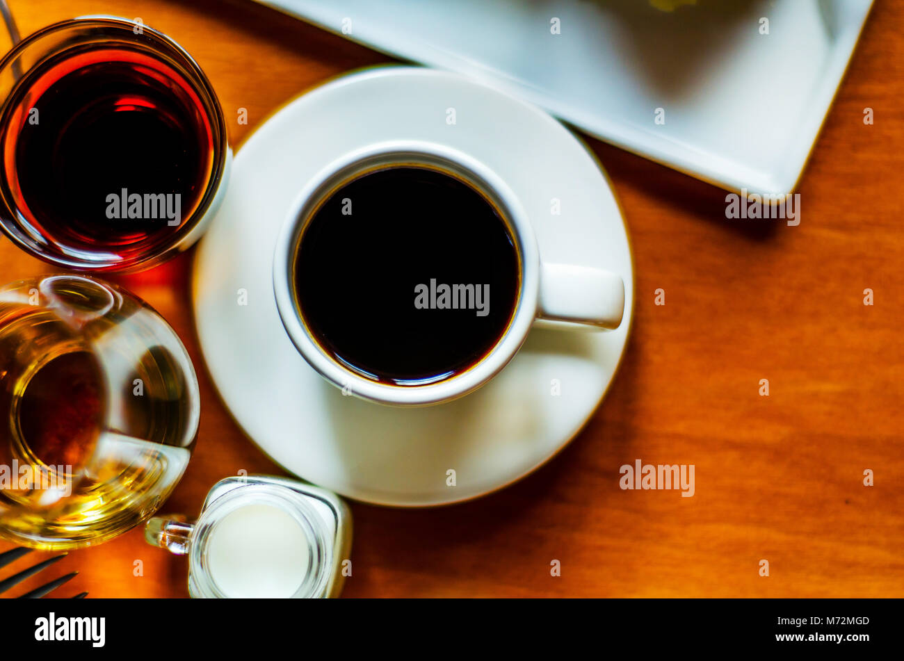 black coffee with set appetizers in small portions, healthy and ...