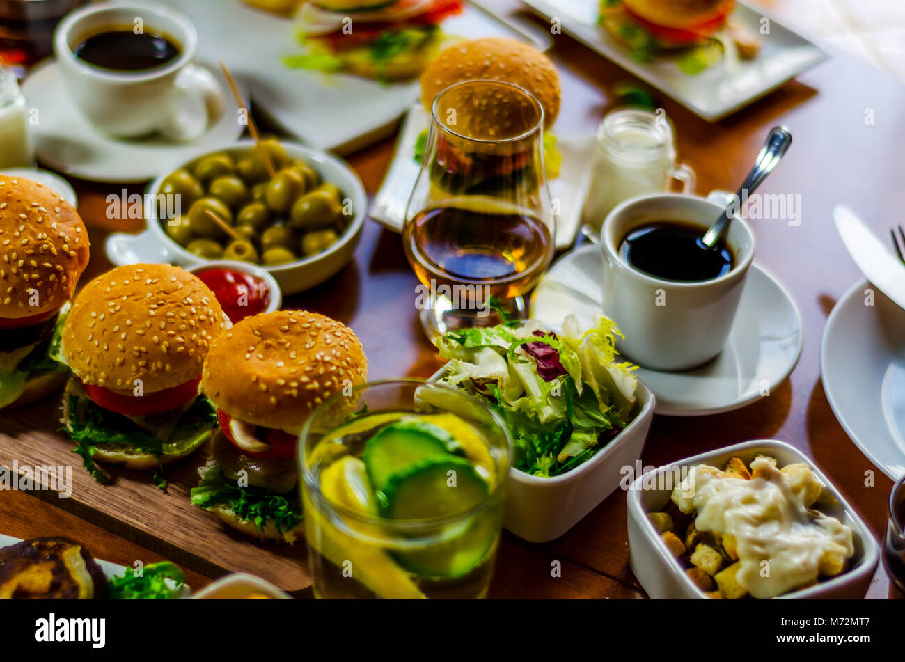 mini burgers with meat, vegetables, cheese and other toppings, bread ...