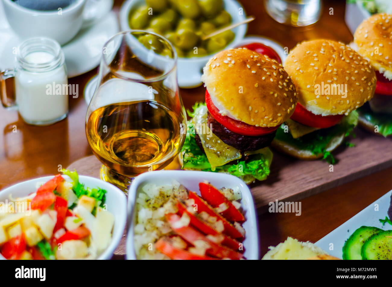 mini burgers with meat, vegetables, cheese and other toppings, bread ...